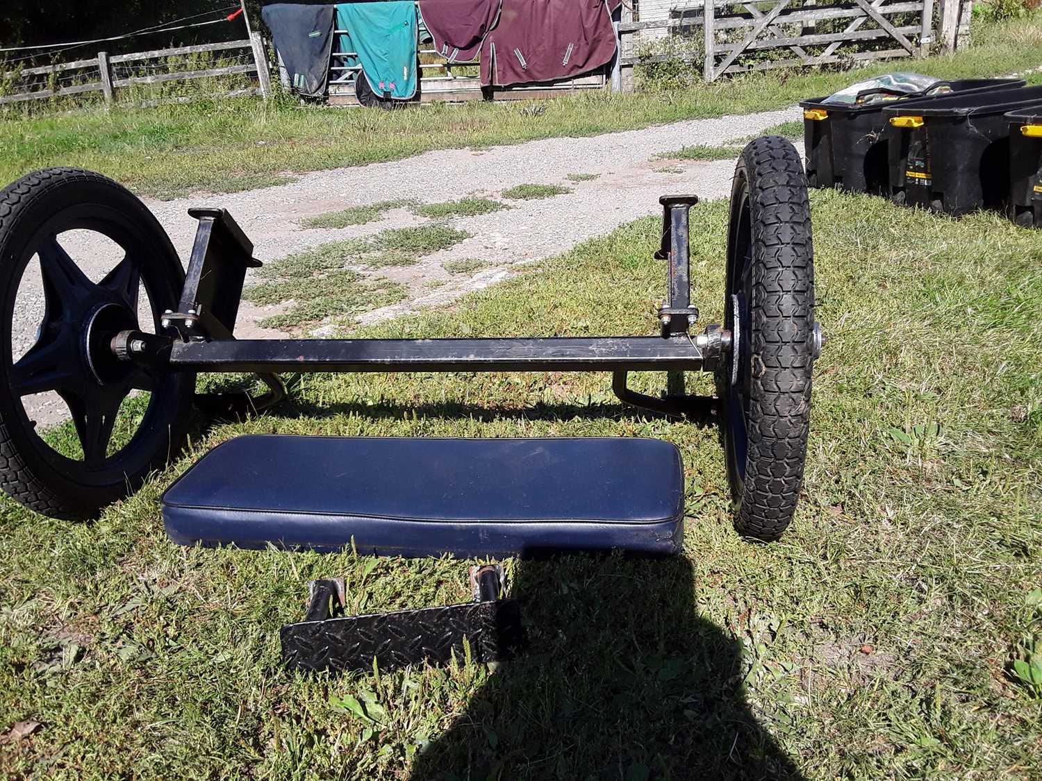 Lot 211 - Hillam exercise cart wheels, axle foot board