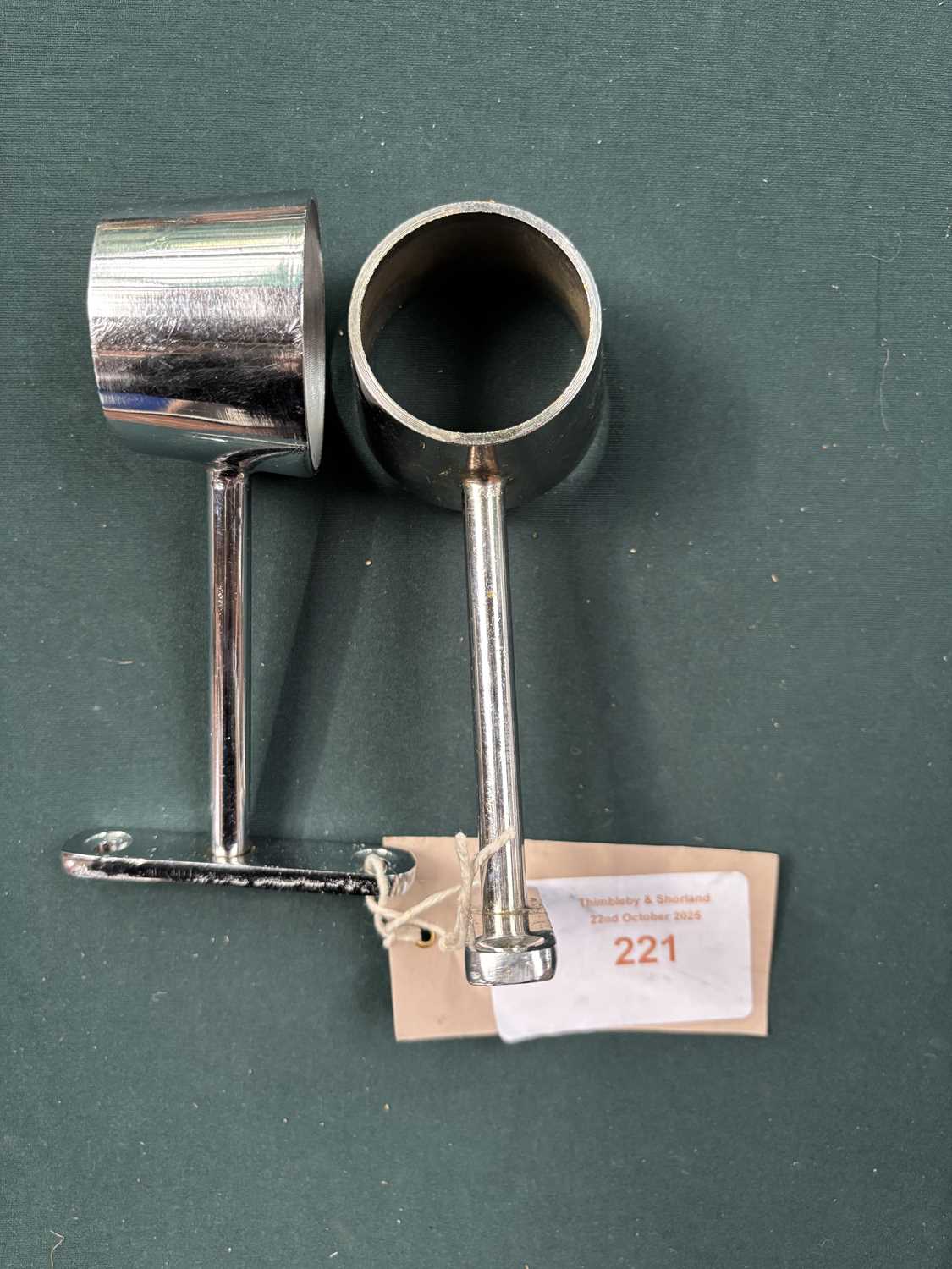 Lot 221 - Pair of white metal lamp brackets. This lot