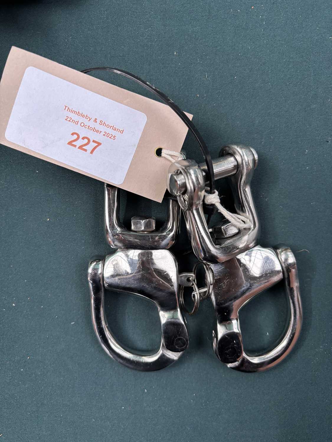 Lot 227 - Pair of stainless steel quick release snaps.