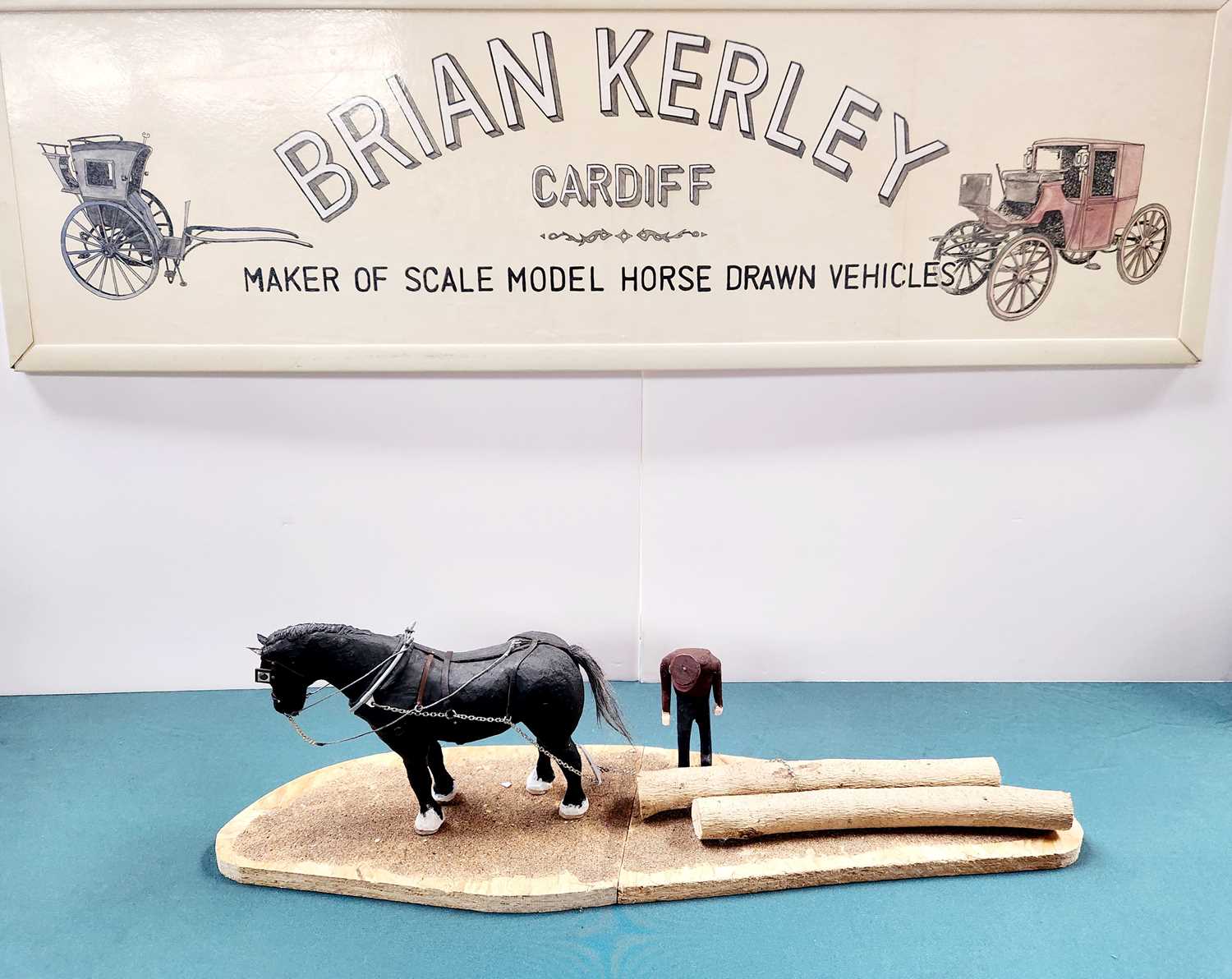 Lot 540 - Black Horse Pulling Logs Model secured to