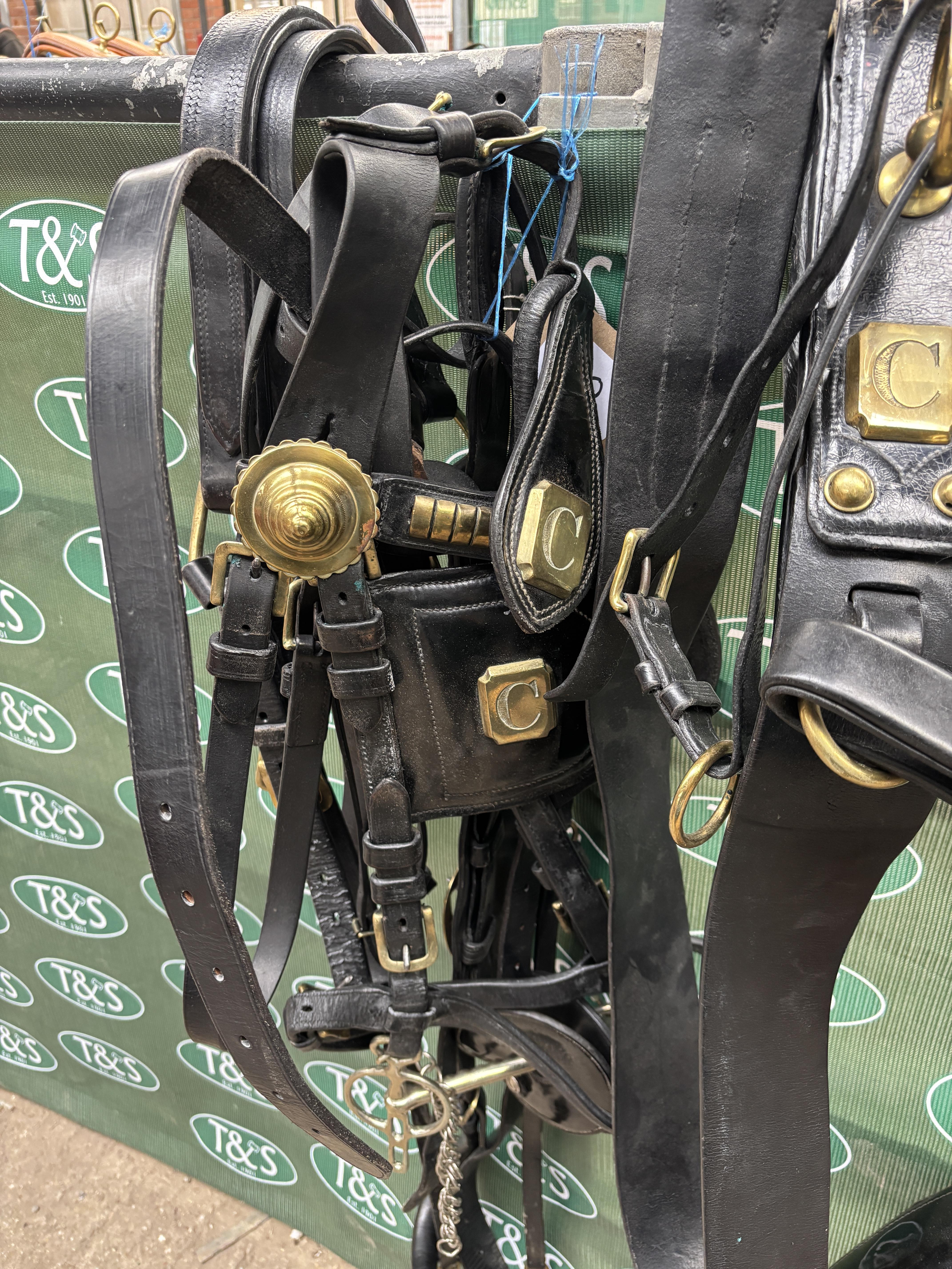 Lot 740 - Set of black leather heavy horse harness